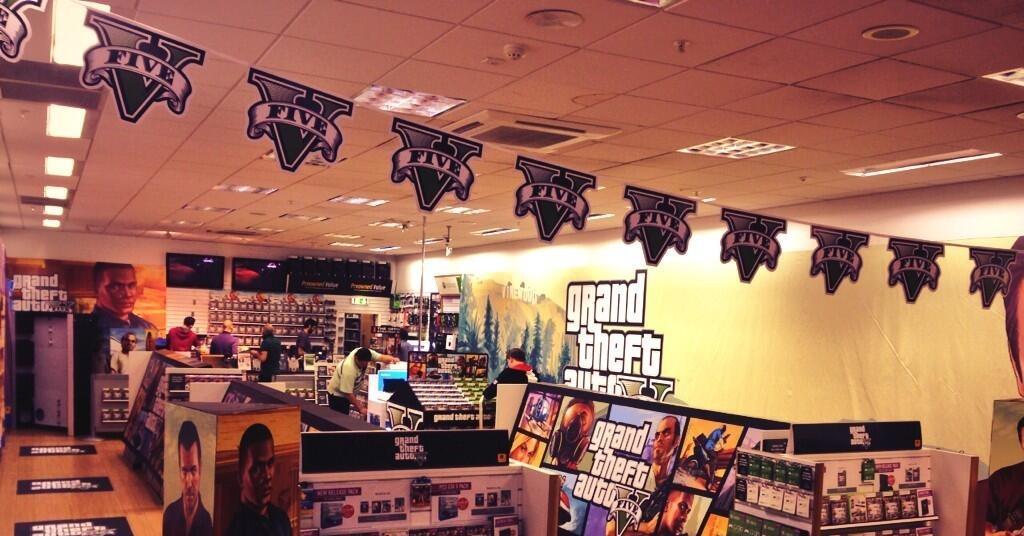 In pictures: Crowds of shoppers mass for Grand Theft Auto release ...