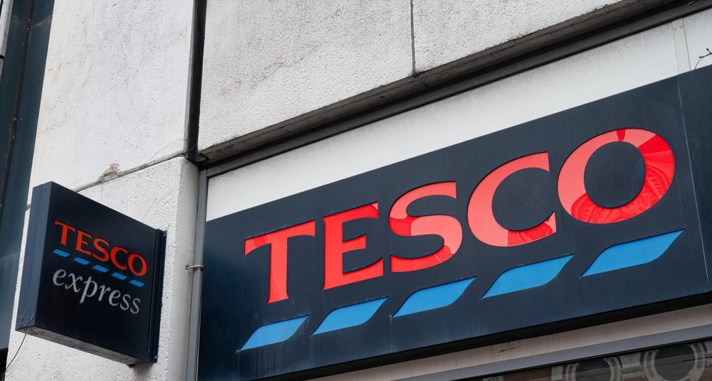 Tesco locks down prices and raises staff pay as profits slip | News ...
